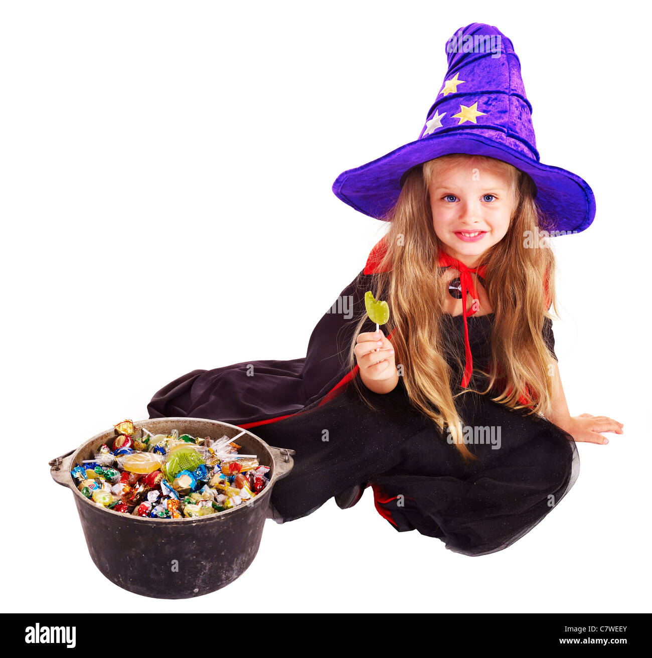 Witch little girl with candy. Halloween Stock Photo - Alamy