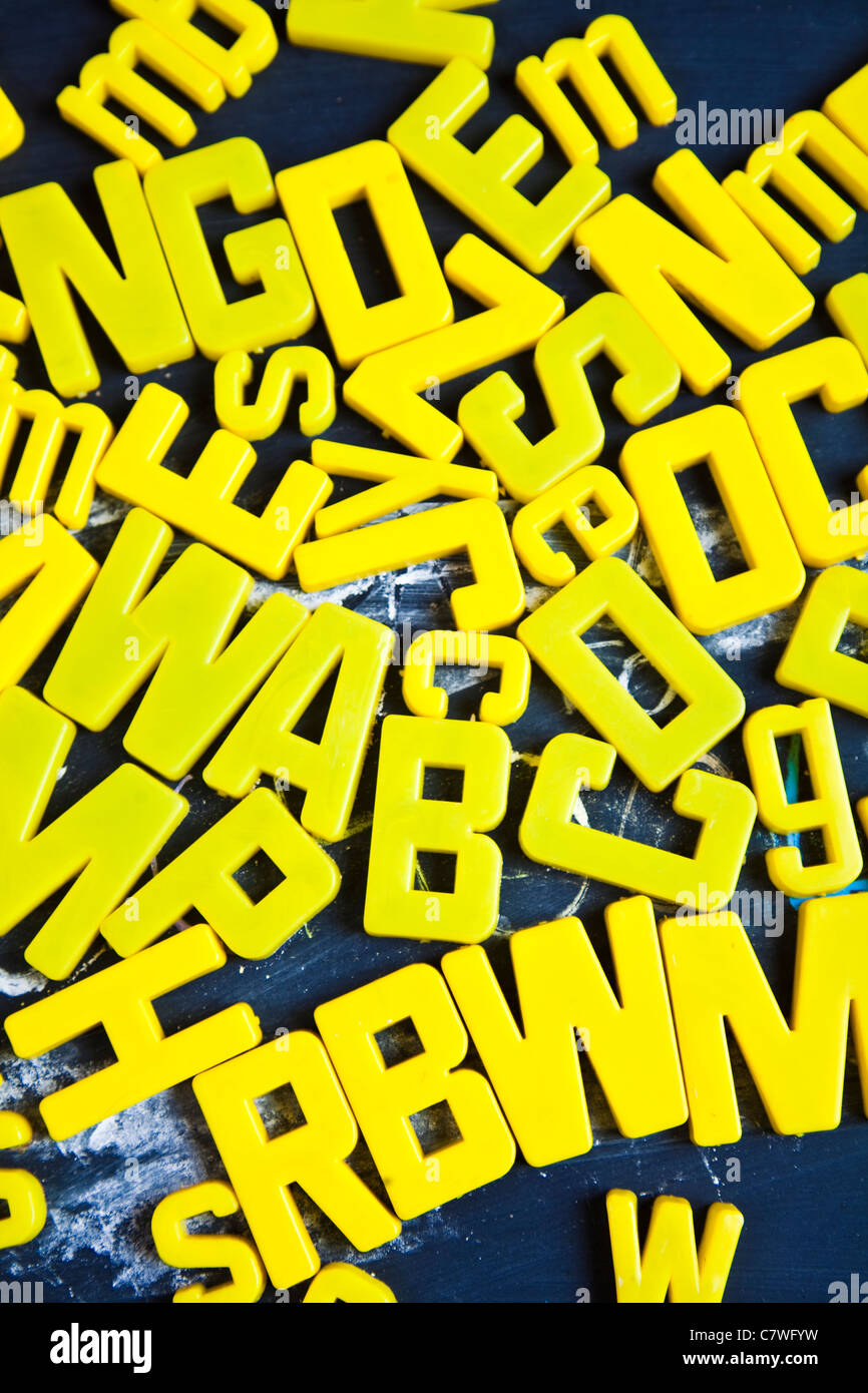 Alphabet and letters on a school blackboard Stock Photo - Alamy