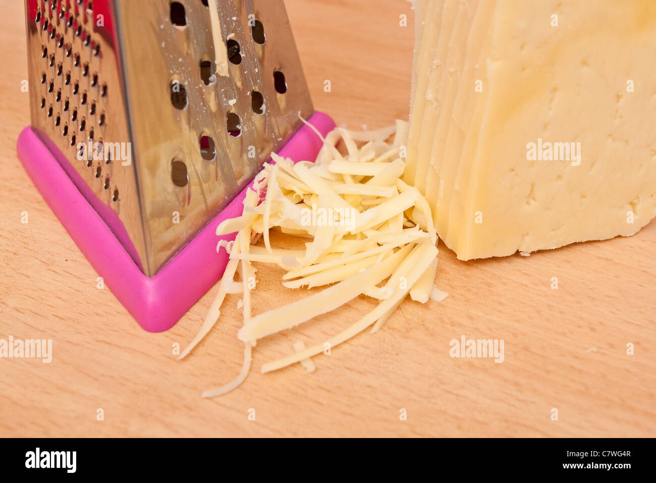 Grater cheese grating hi-res stock photography and images - Alamy