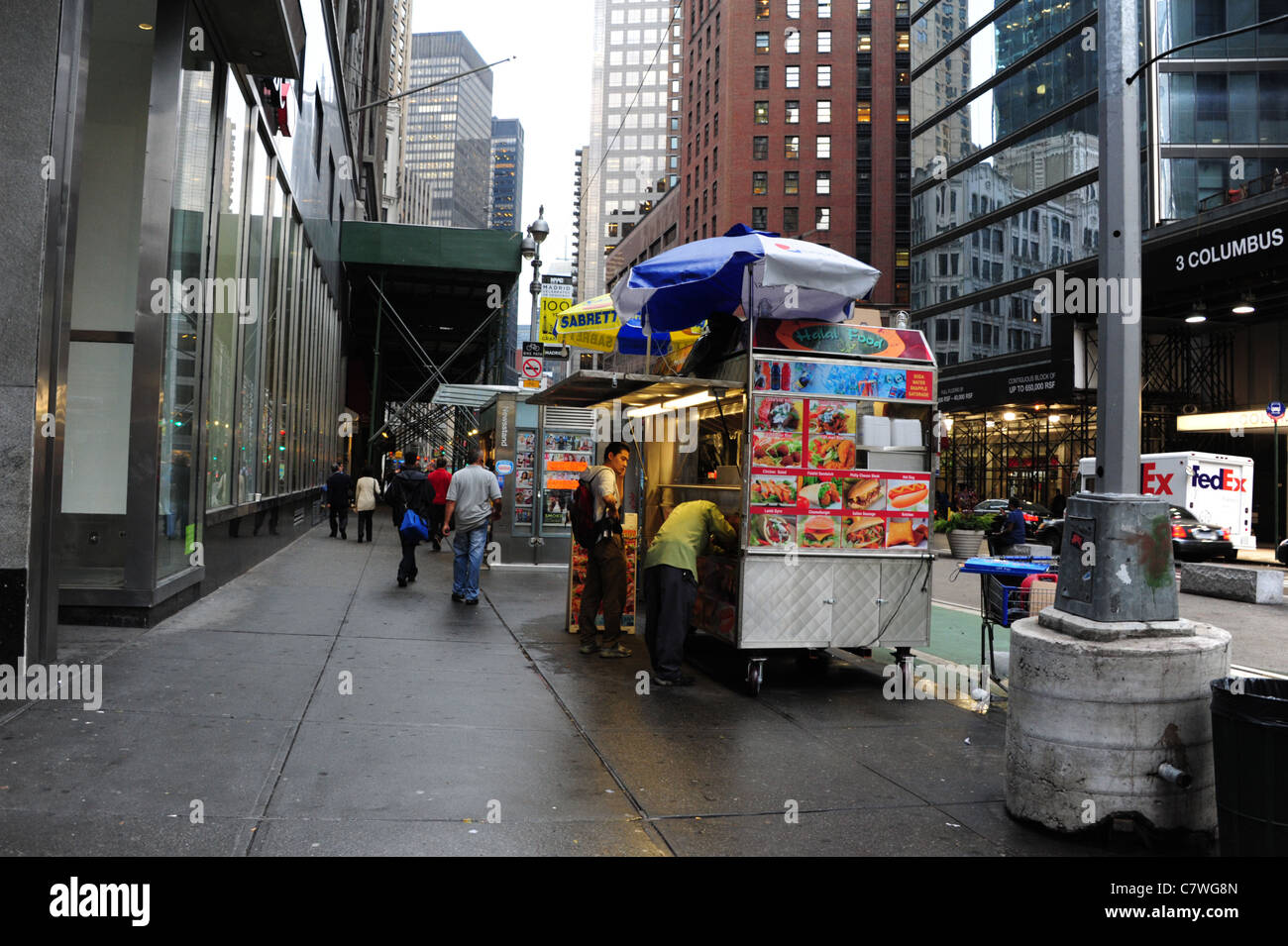 Grey wet autumn afternoon view mobile snack stall serving fast food ...