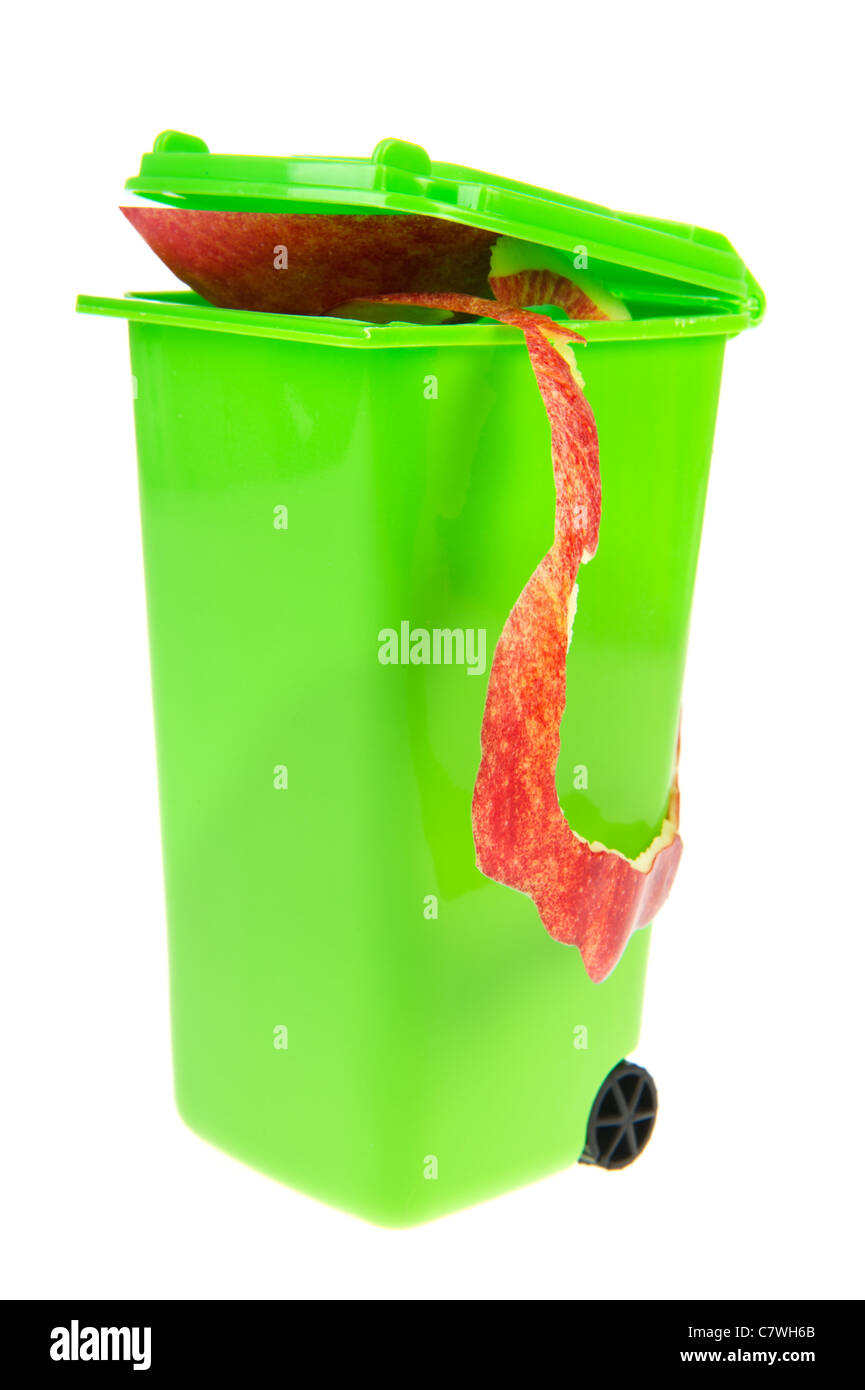 Green container with organic garbage isolated over white background ...