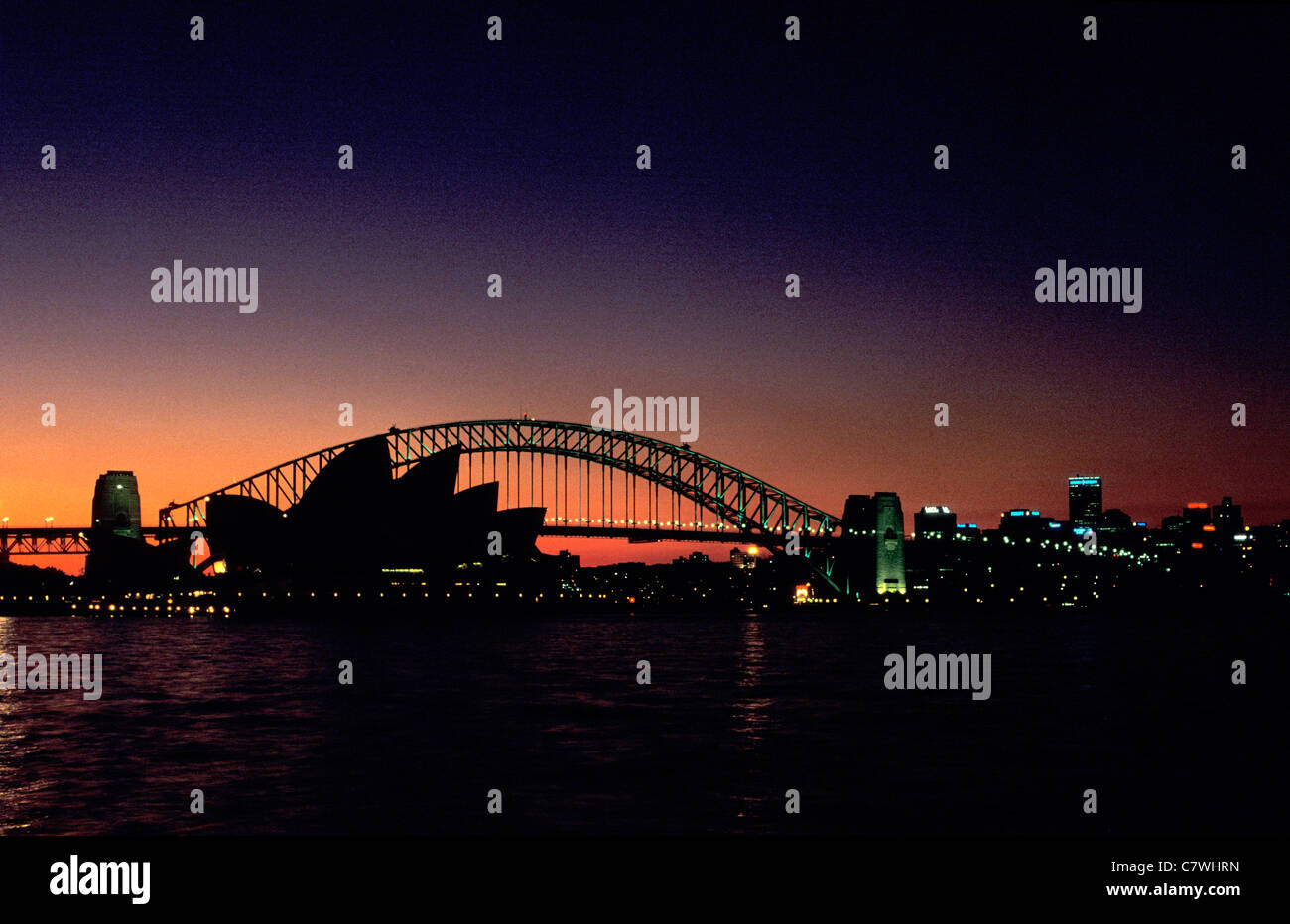 Sydney Harbour Bridge and Opera House at dusk Stock Photo - Alamy