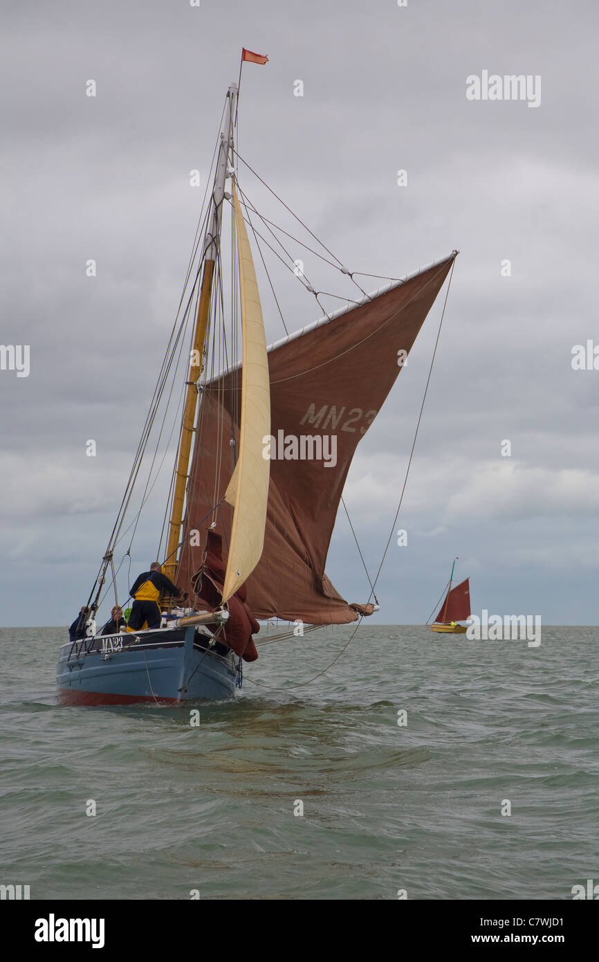 Oyster smack in full sail off West Mersea, Essex, UK. Marine scape ...