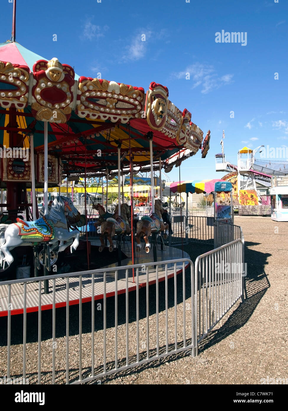 A merry-go-round stands empty at a country carnival Stock Photo - Alamy