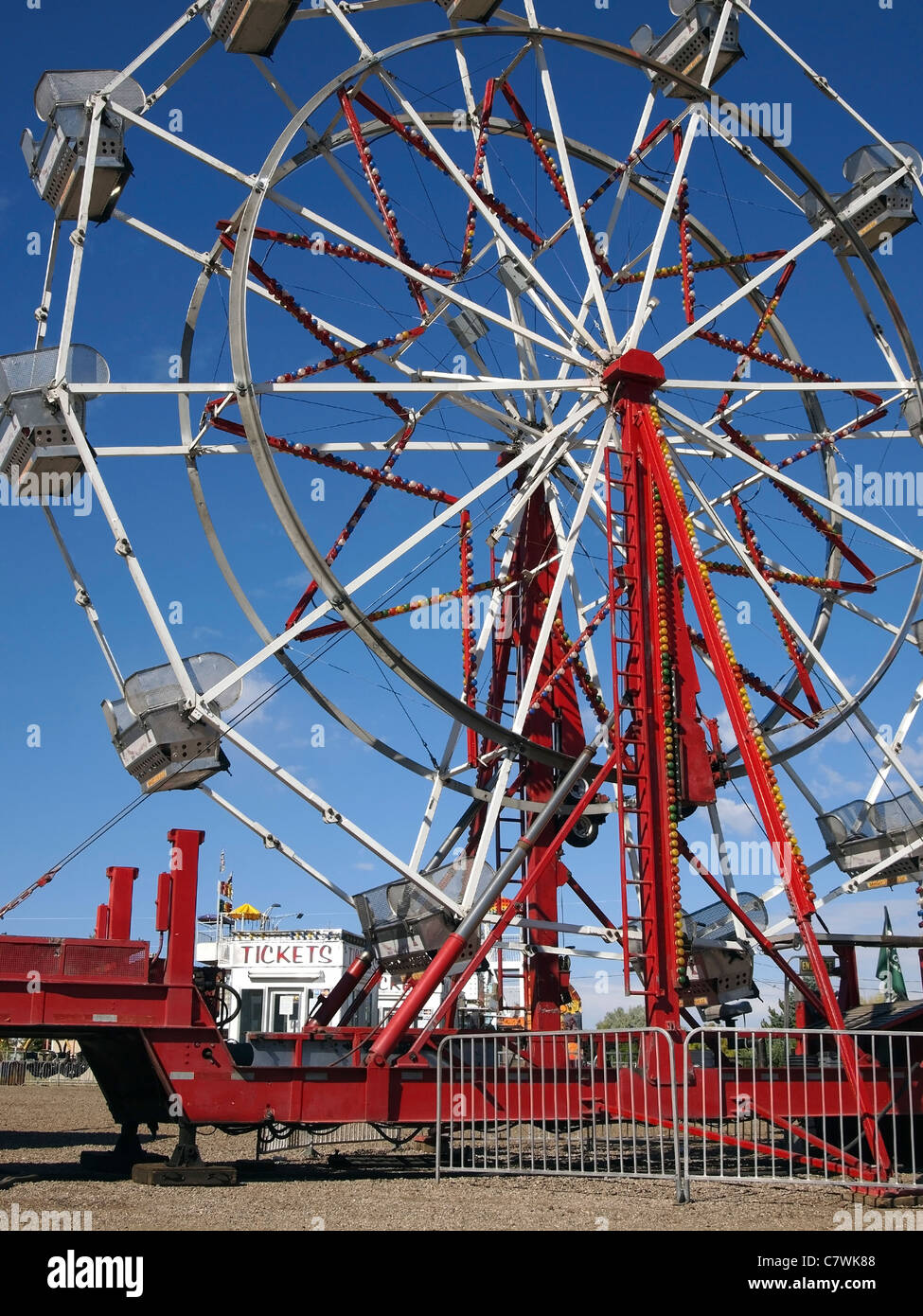 A ferris wheel stands empty at a country carnival Stock Photo - Alamy