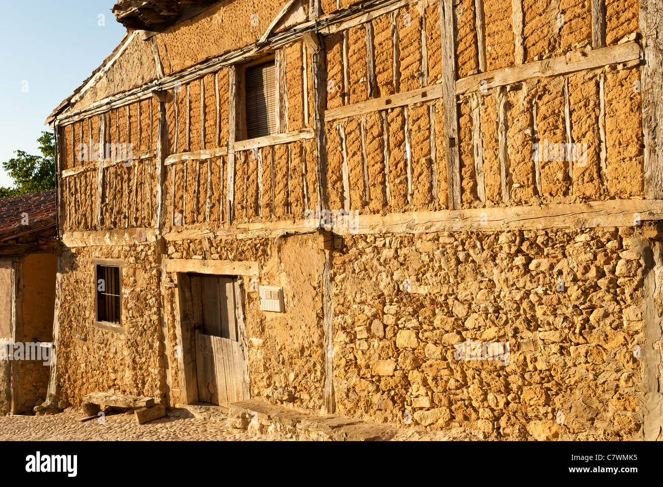 Medieval adobe house facade in Calatanazor, Spain Stock Photo - Alamy