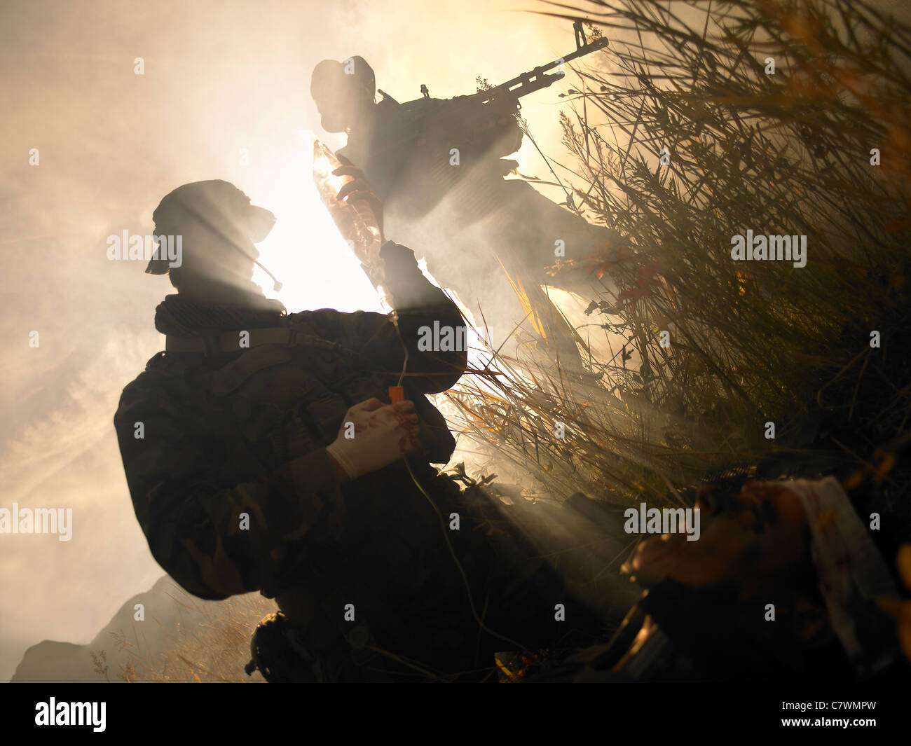 U.S. Navy SEALs give first aid to a wounded soldier Stock Photo - Alamy