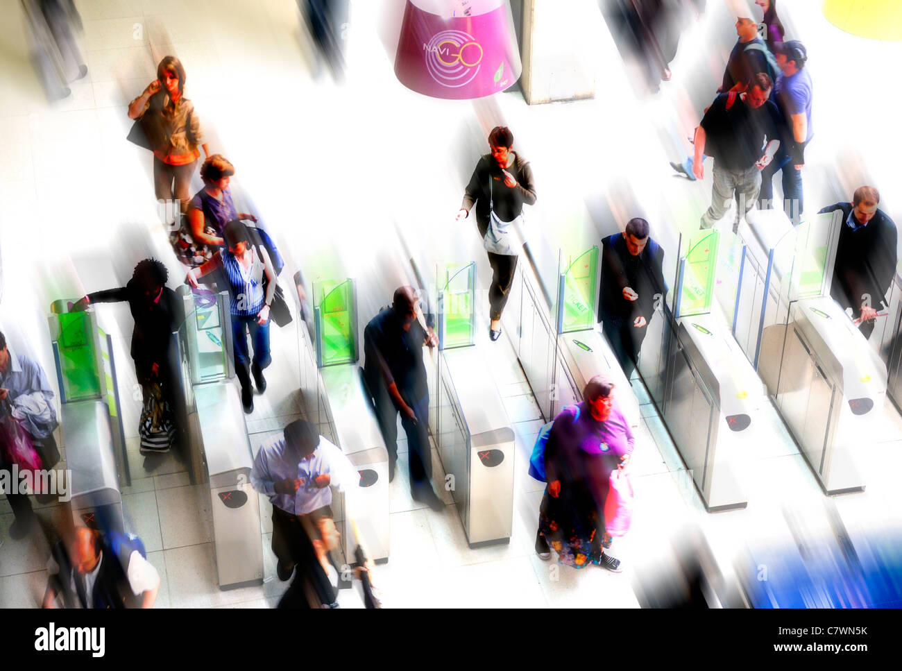 People passing through ticket gates hi-res stock photography and images ...