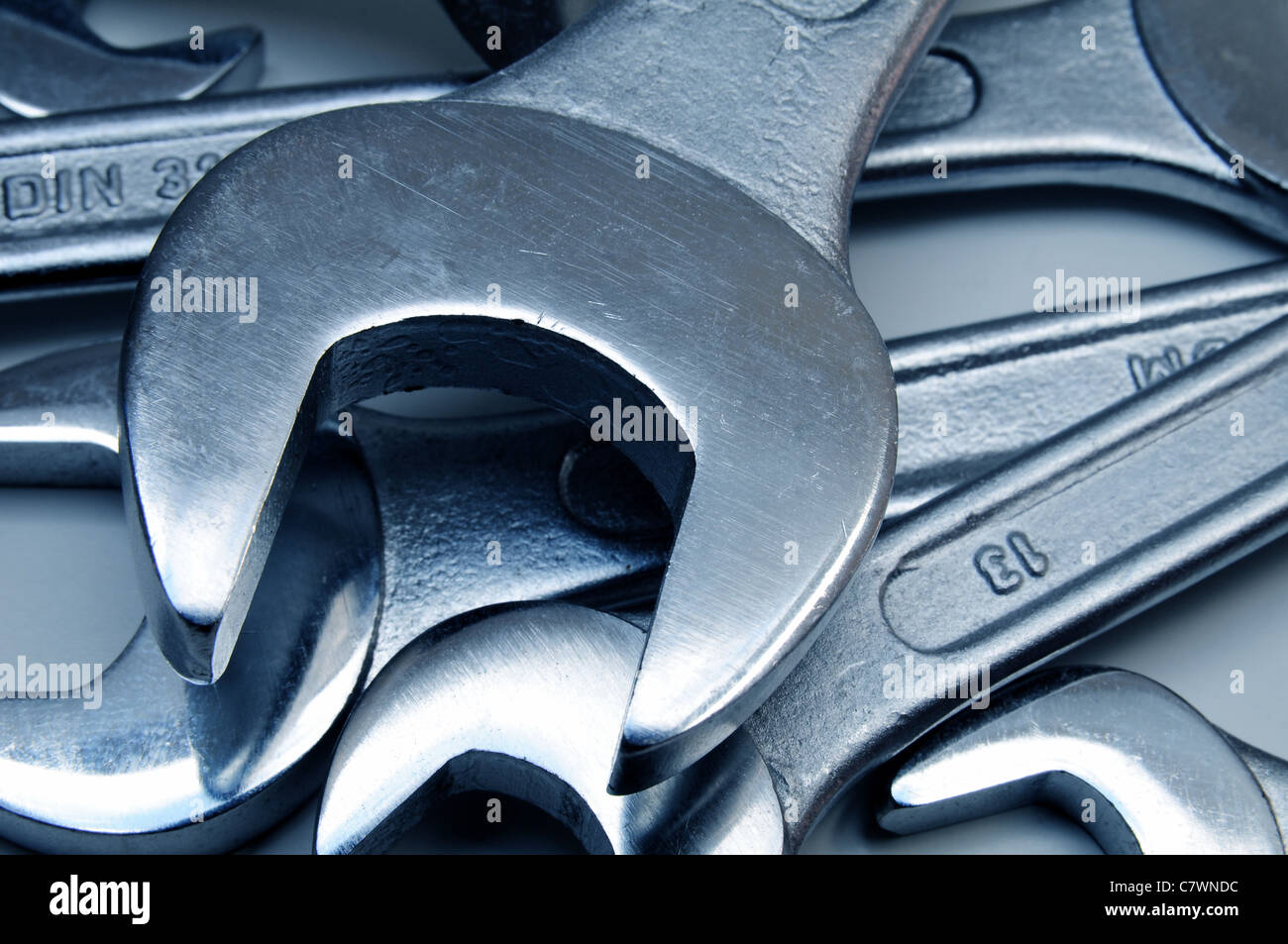 Group of industrial spanners - Blue toned Stock Photo - Alamy