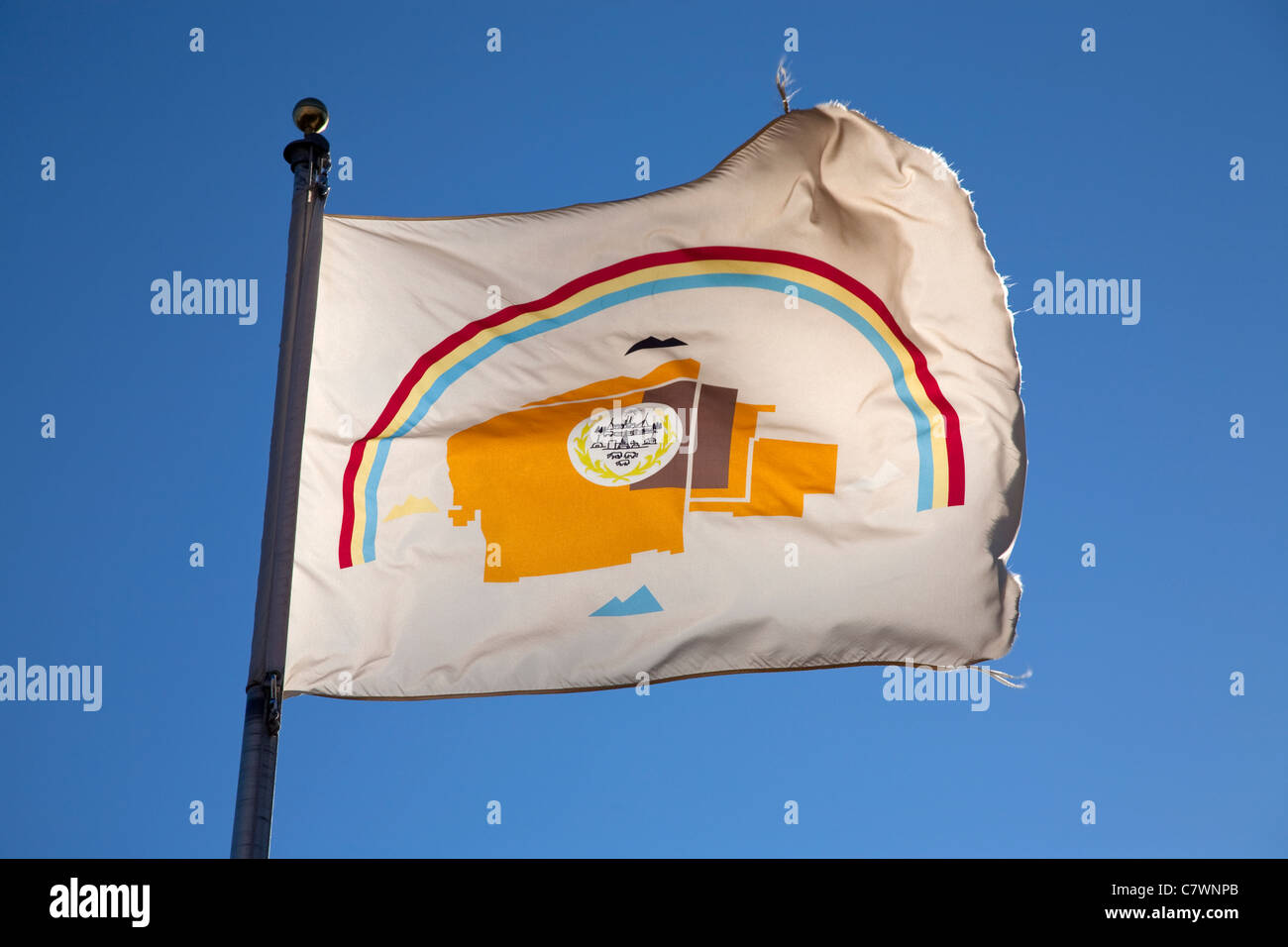 flag of the navajo nation native american indians against a blue summer ...