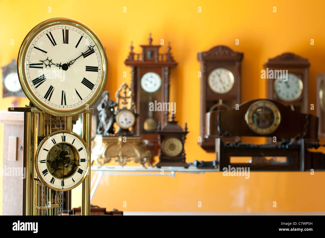 Old antique clocks close up and blurred background clocks Stock Photo ...