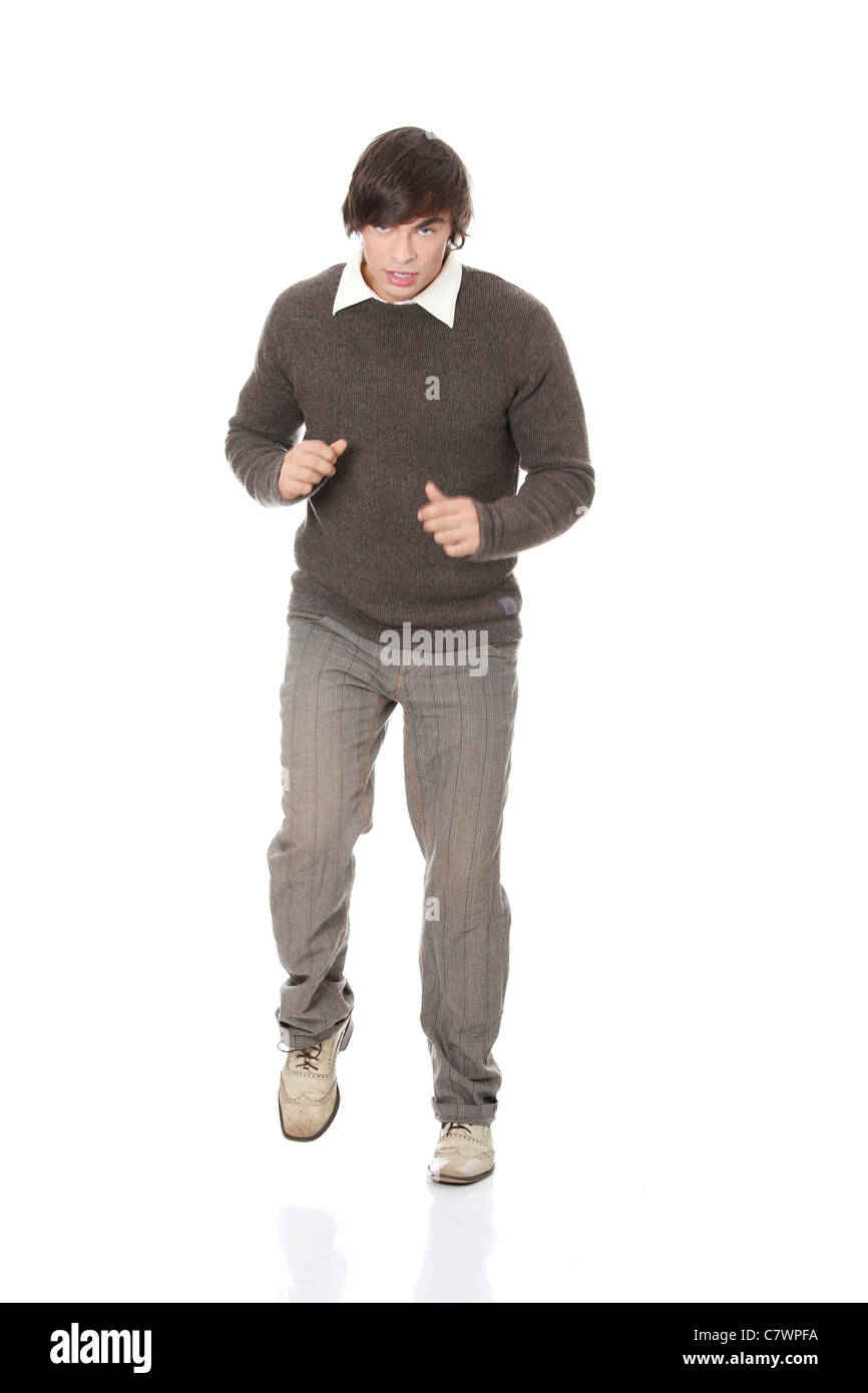 Happy young man running, over white Stock Photo - Alamy
