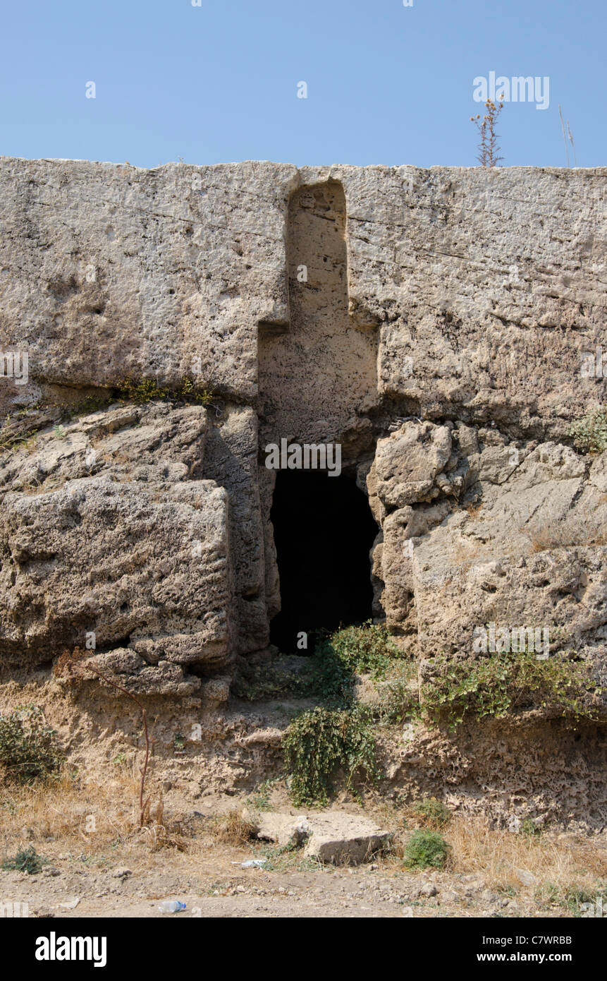 showing a rock cut tombs at ancient Lambousa also cut out to take a ...