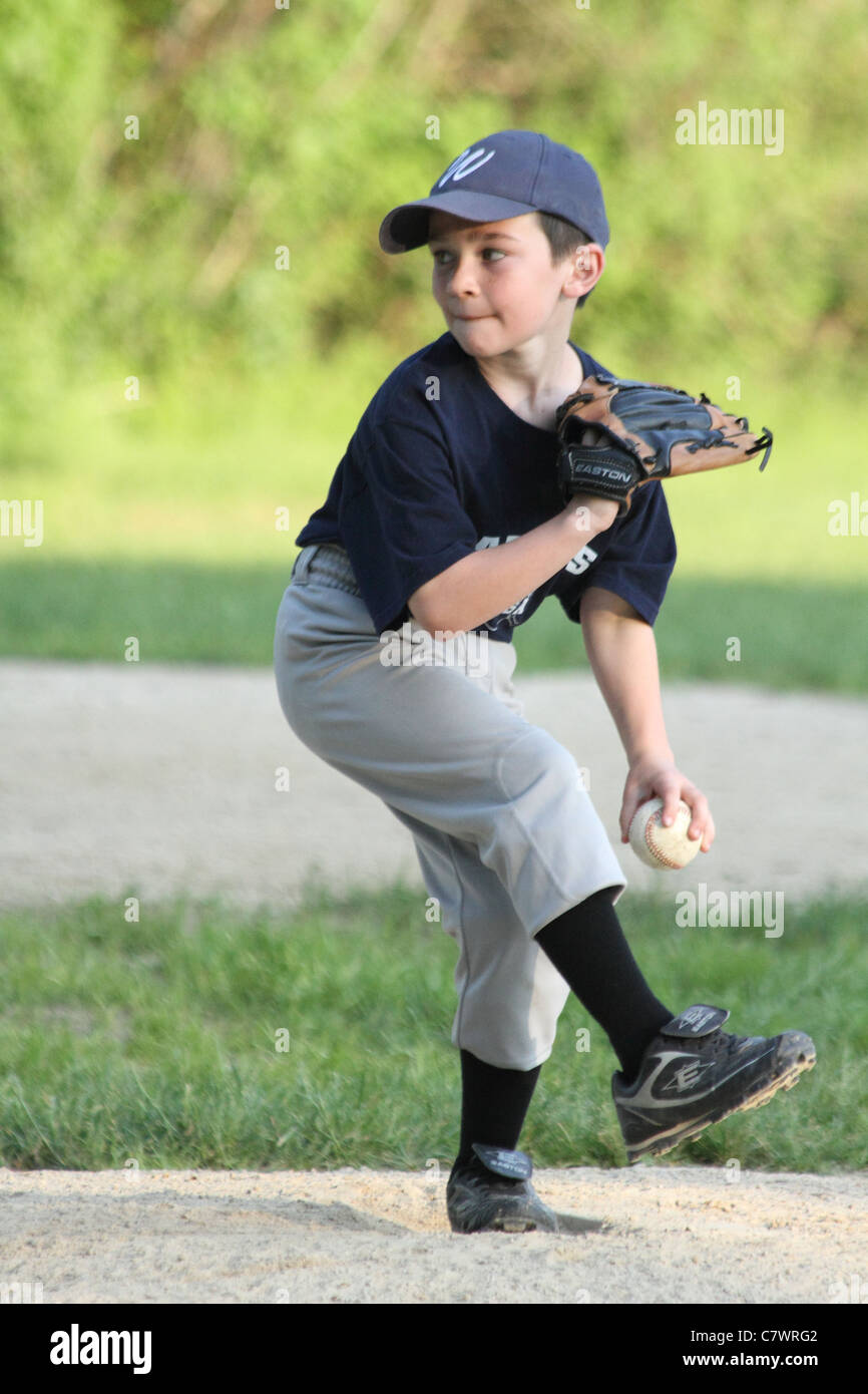Pitcher in action ready to deliver strike or ball Stock Photo - Alamy