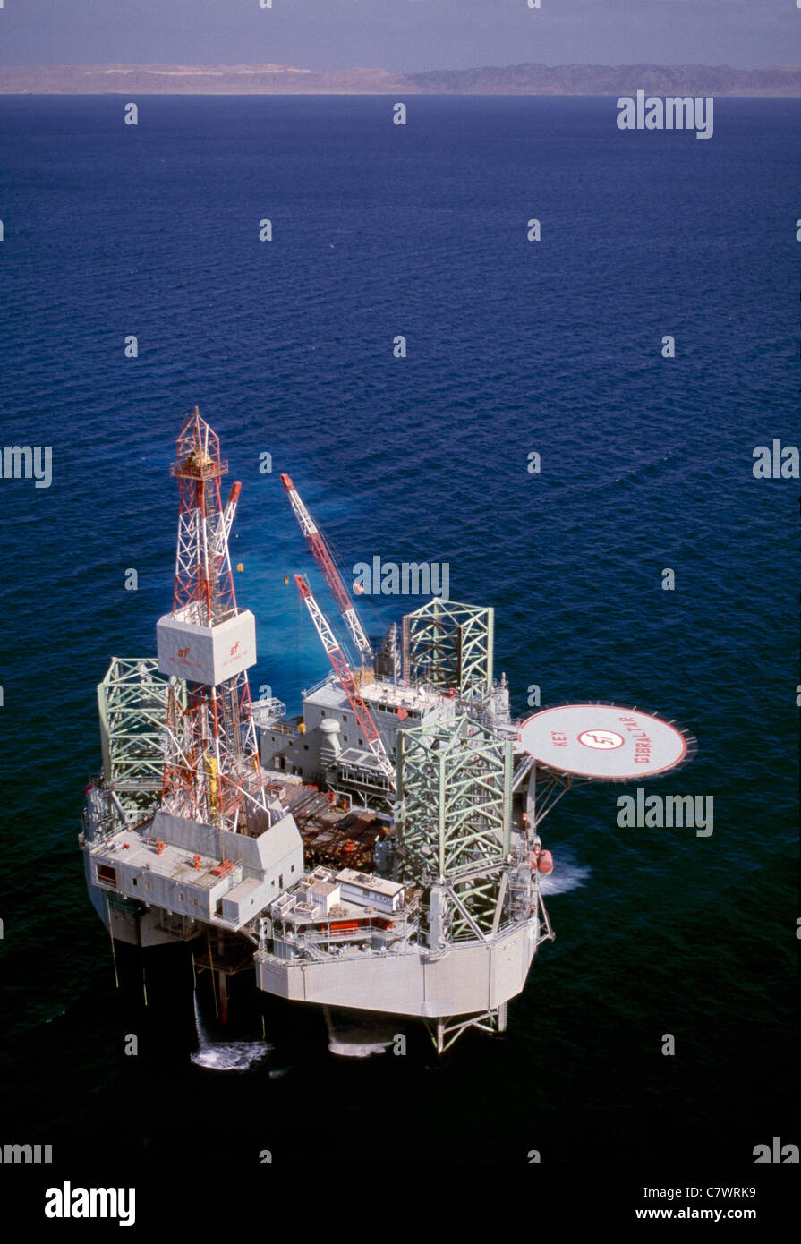 A jackup oil rig explores for oil in the Egyptian waters of the Red Sea ...