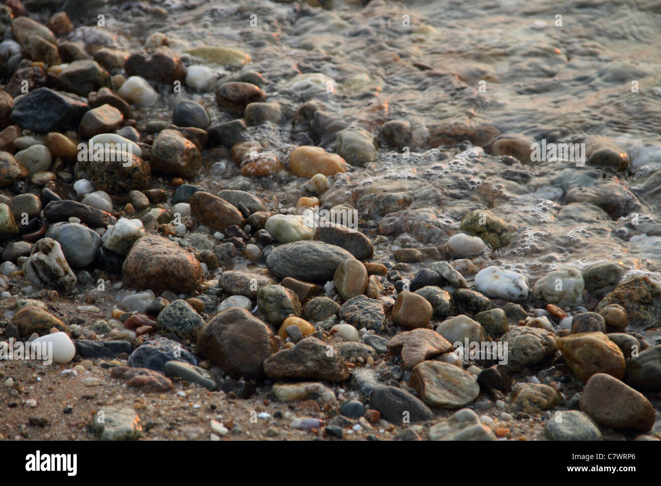 Water over pebbles hi-res stock photography and images - Alamy