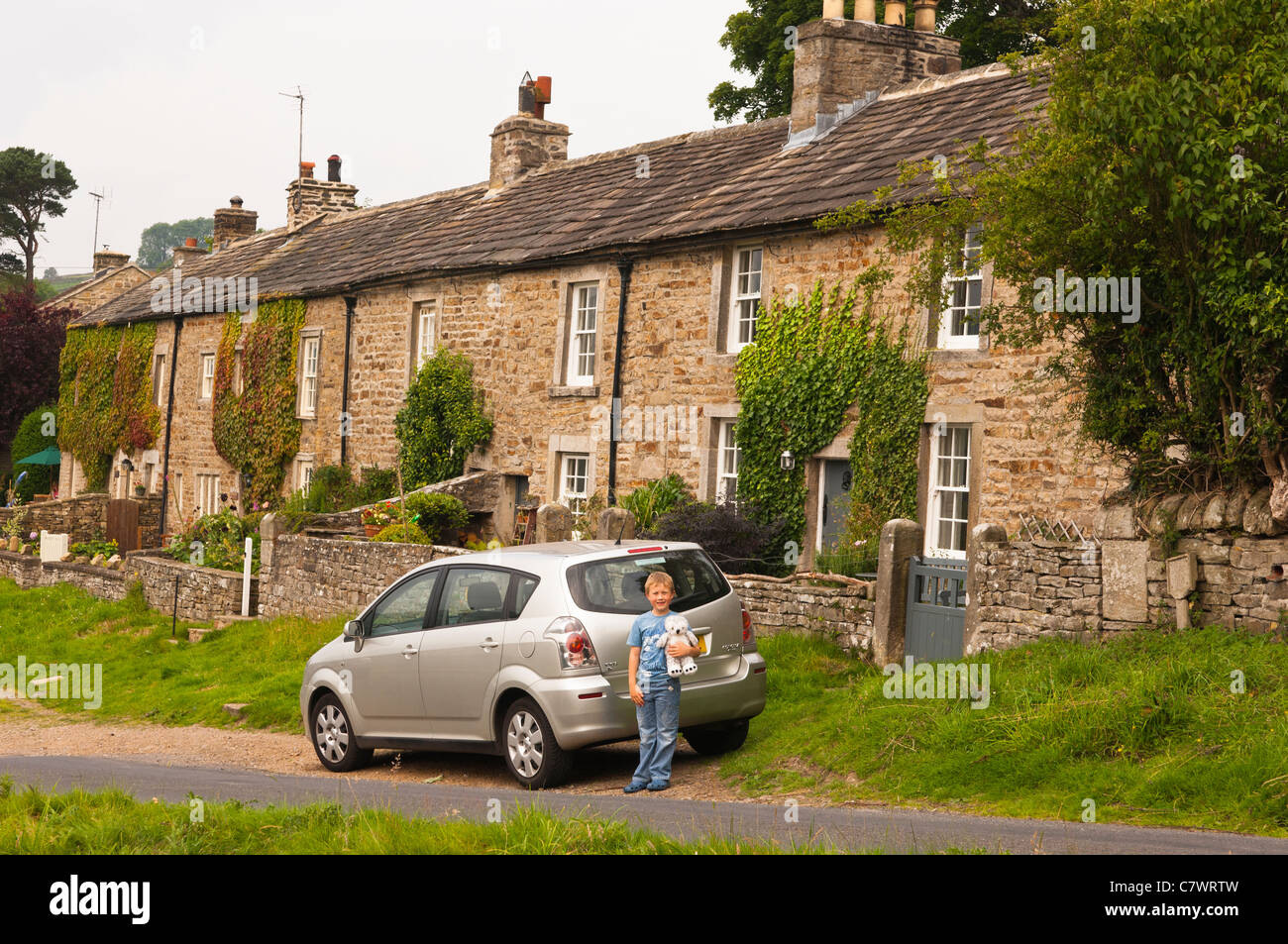 A row of cottages in Low Row in Swaledale in North Yorkshire , England ...