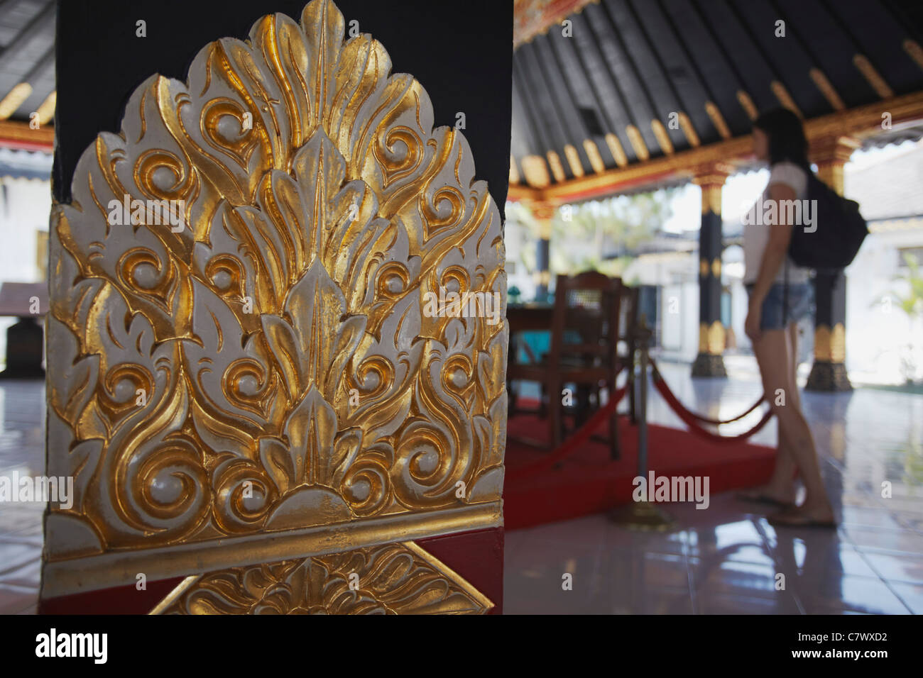 Woman inside Golden Pavilion (Bangsal Kencana) in grounds of Kraton ...