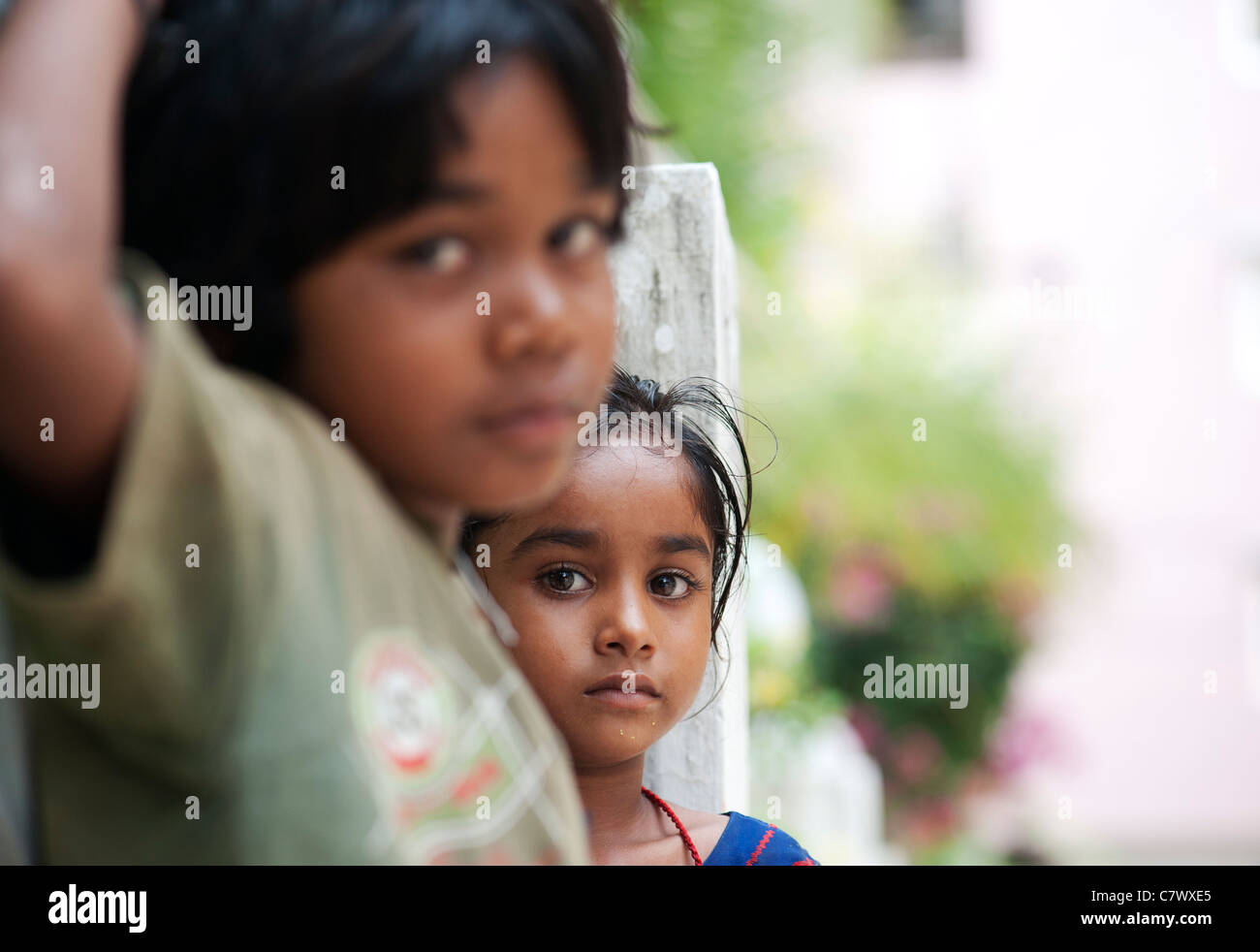 Young poor lower caste Indian street brother and sister. selective ...