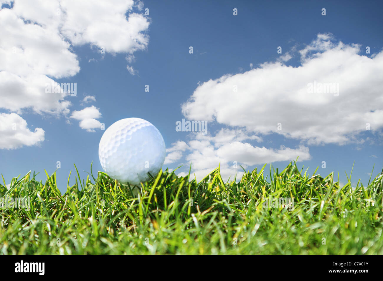 Close up golf course with one ball over blue sky Stock Photo - Alamy