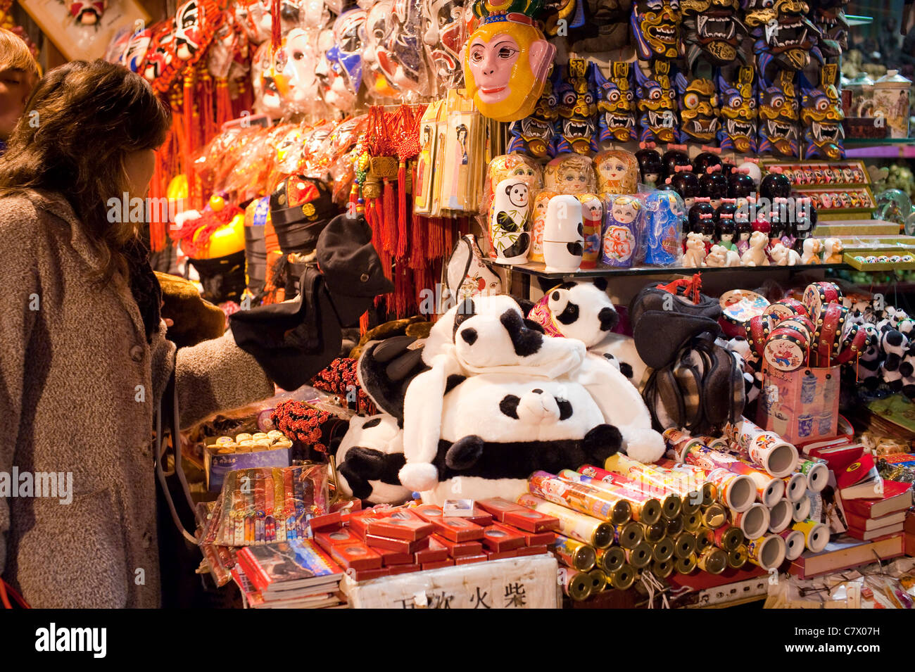Chinese woman shops in Wangfujing night market, Beijing Stock Photo - Alamy