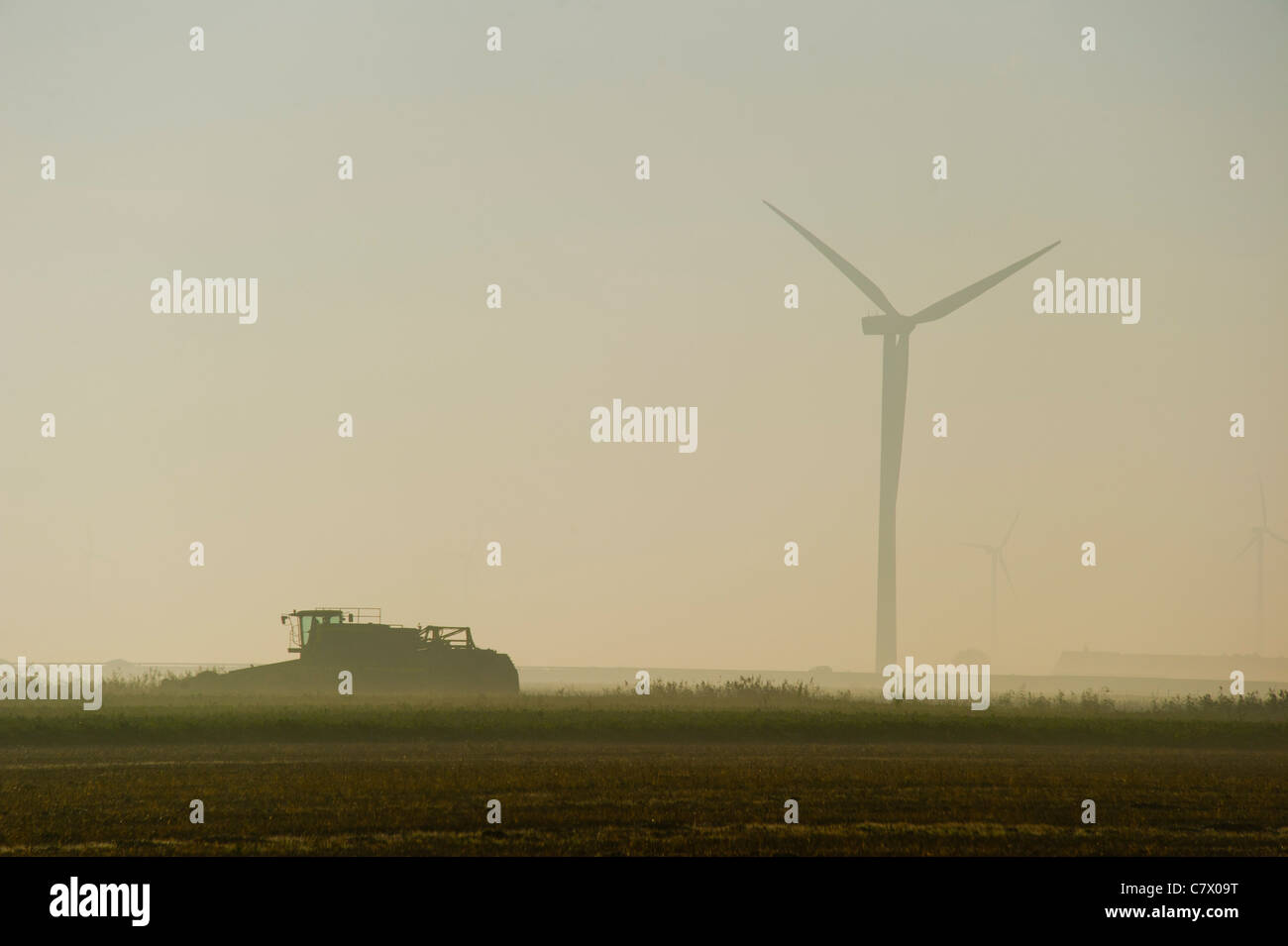 Plower in farming land early morning Stock Photo - Alamy