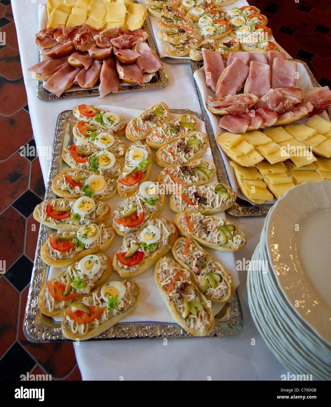 Bread toast for lunch with salad dressing laid out on table Stock Photo ...