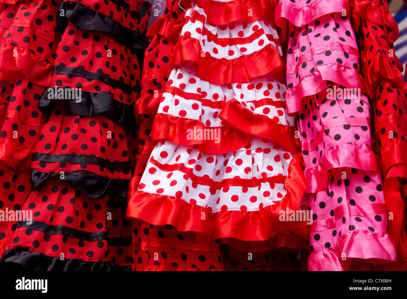 colorful red pink gipsy costumes of flamenco dancer in andalusian Stock ...