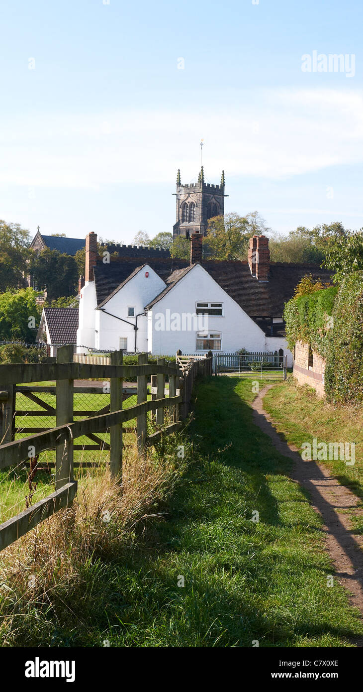 Countryside view with St Mary`s church and farm in Sandbach Cheshire UK ...