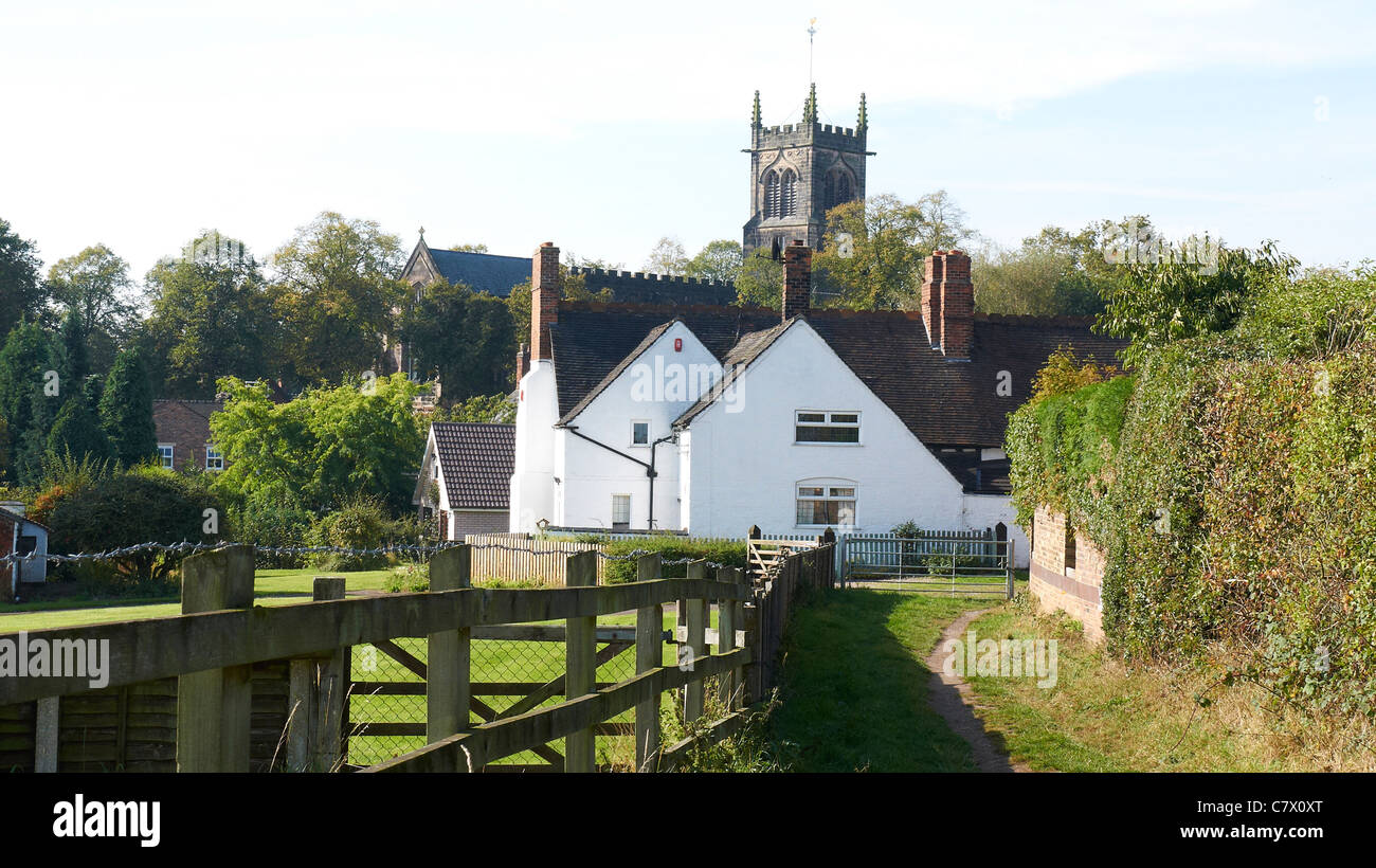 Countryside view with St Mary`s church and farm in Sandbach Cheshire UK ...