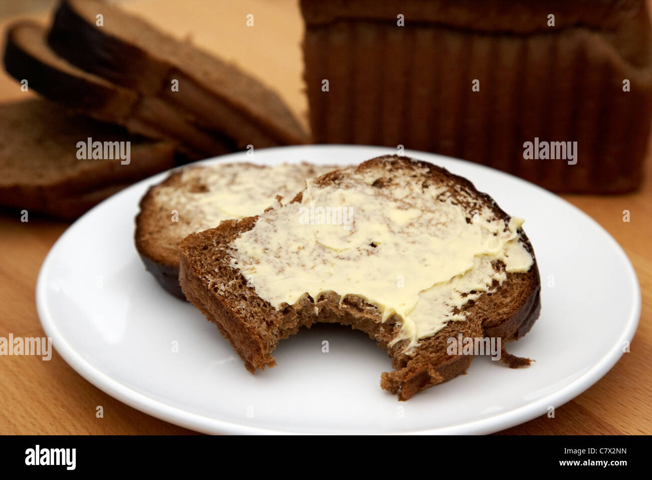 Bitten loaf of bread hi-res stock photography and images - Alamy