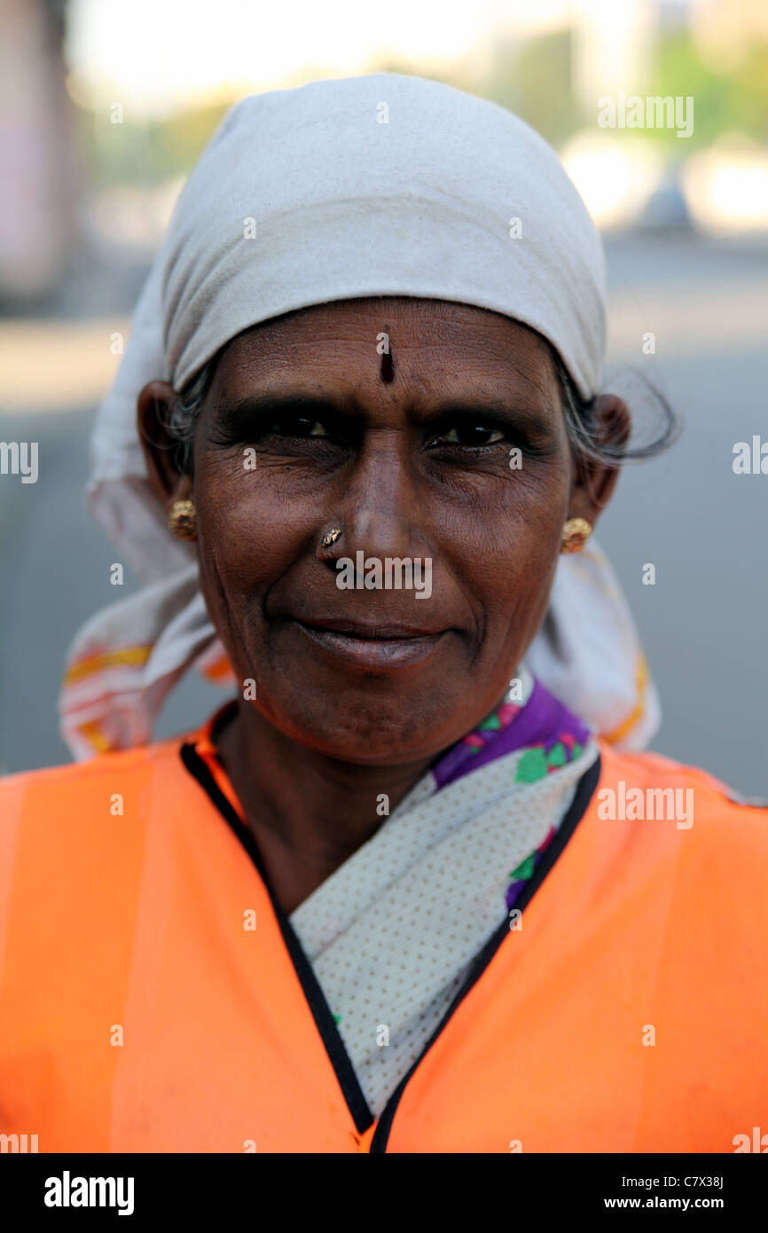 Woman street sweeper hi-res stock photography and images - Alamy