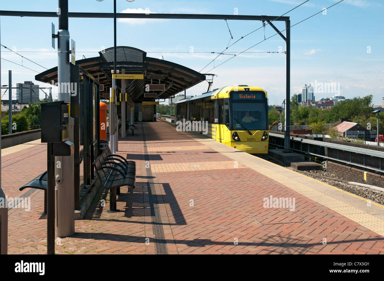 A tram at the Cornbrook stop on the Metrolink tram system, Manchester ...