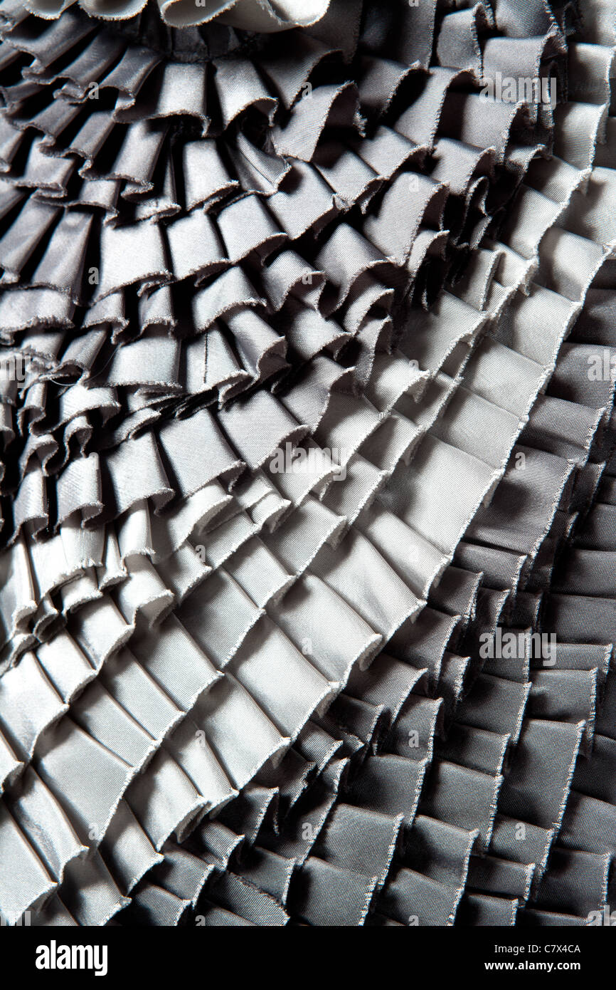 gray ruffled skirt pleated texture fashion background Stock Photo - Alamy