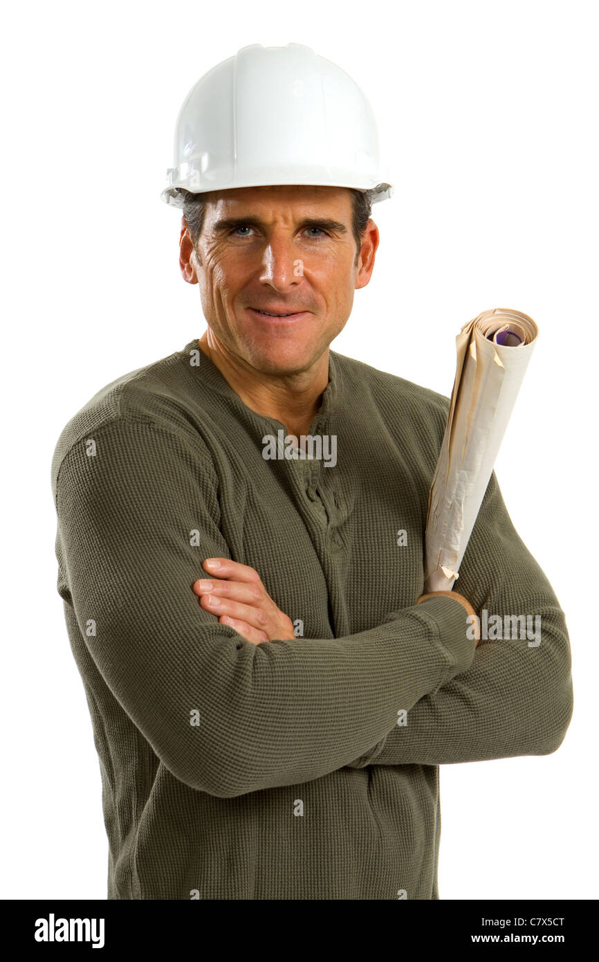 Boss of a construction company stands with crossed arms and holding ...