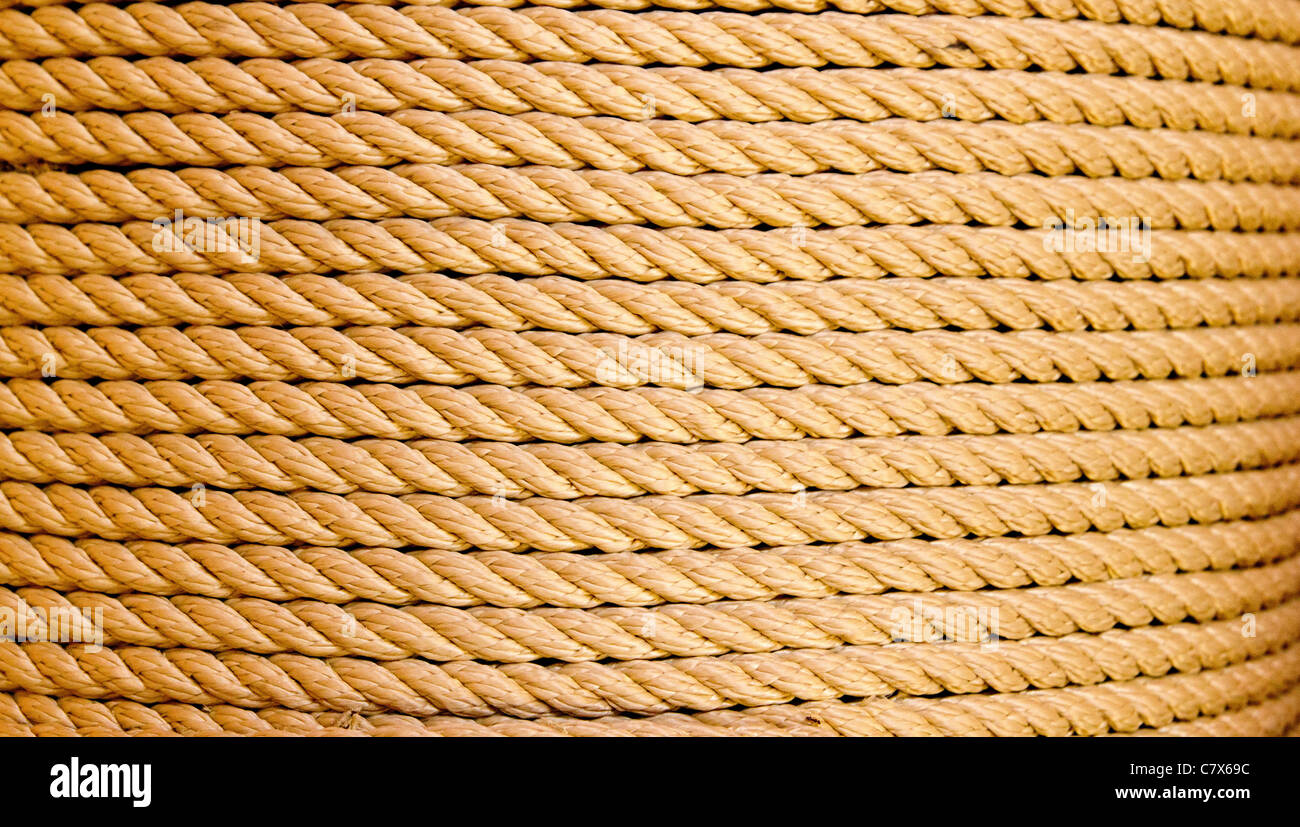 brown rope in big round reel texture Stock Photo - Alamy