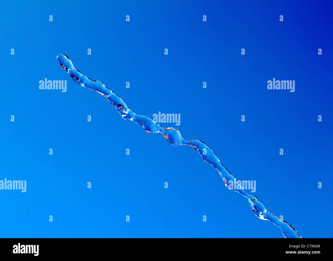 water splash line in blue sky background Stock Photo - Alamy