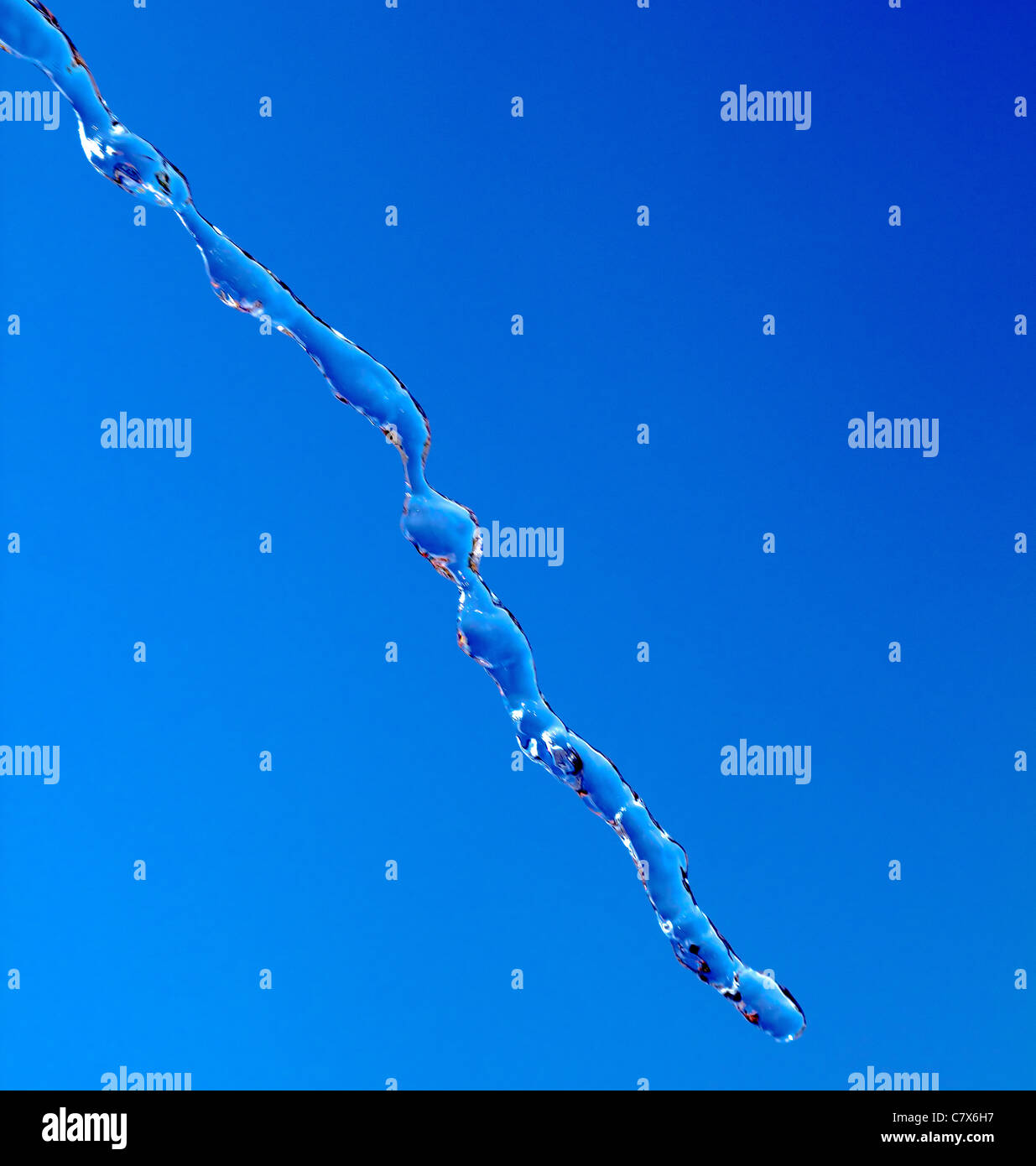 water splash line in blue sky background Stock Photo - Alamy