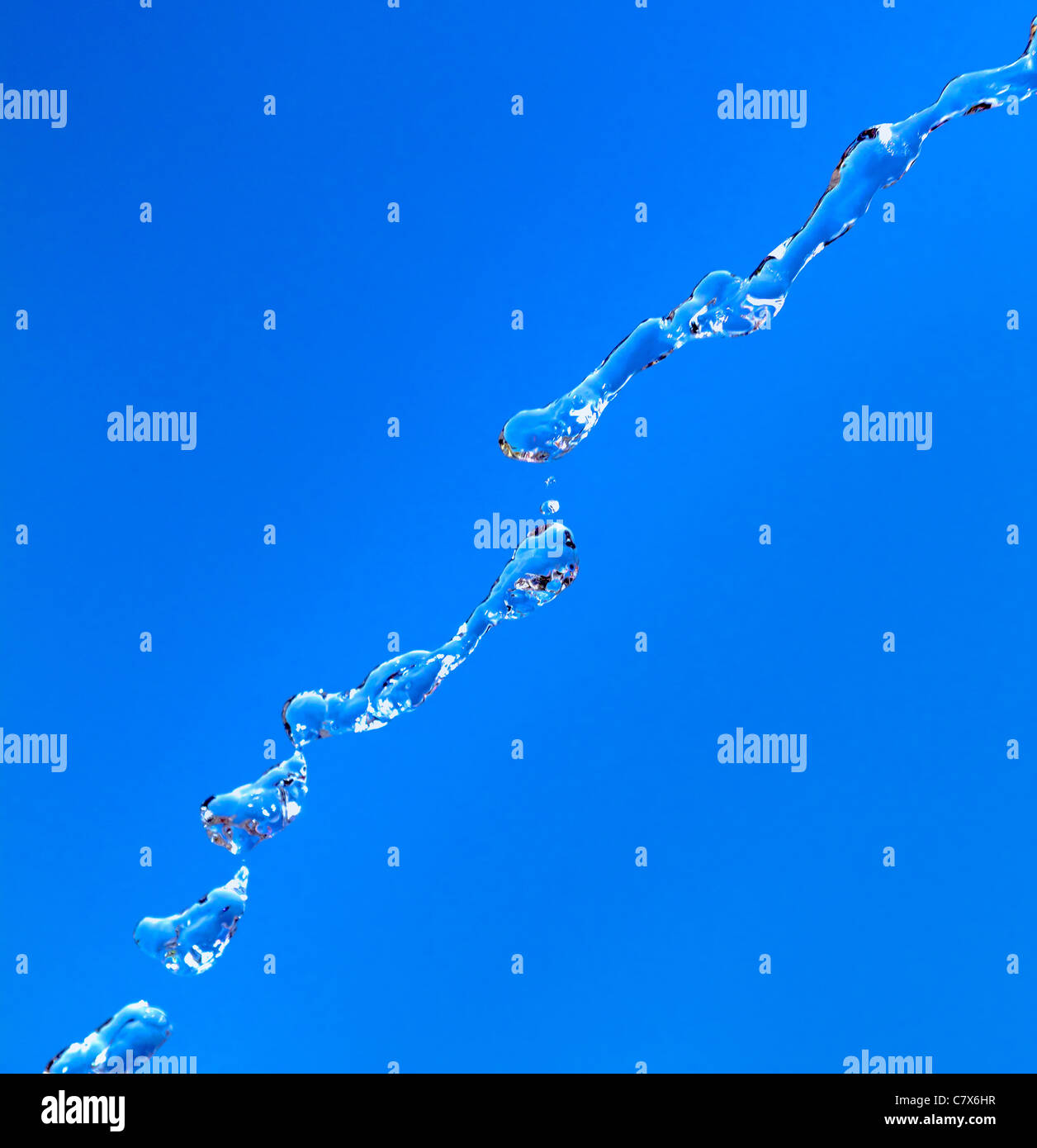 water splash line in blue sky background Stock Photo - Alamy