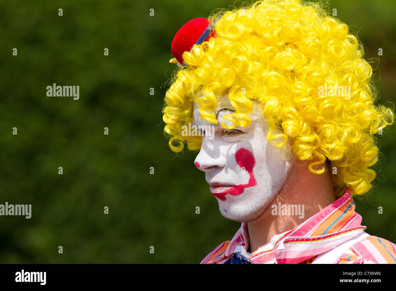Clown marching in Labor Day parade in Marlborough Massachusetts.Aleppo ...