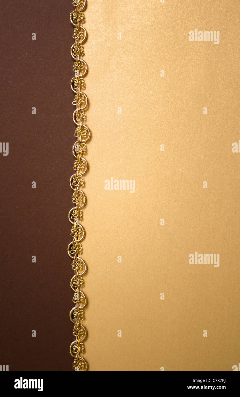 Brown-Yellow Wrapper paper texture and Gold ribbon Stock Photo - Alamy