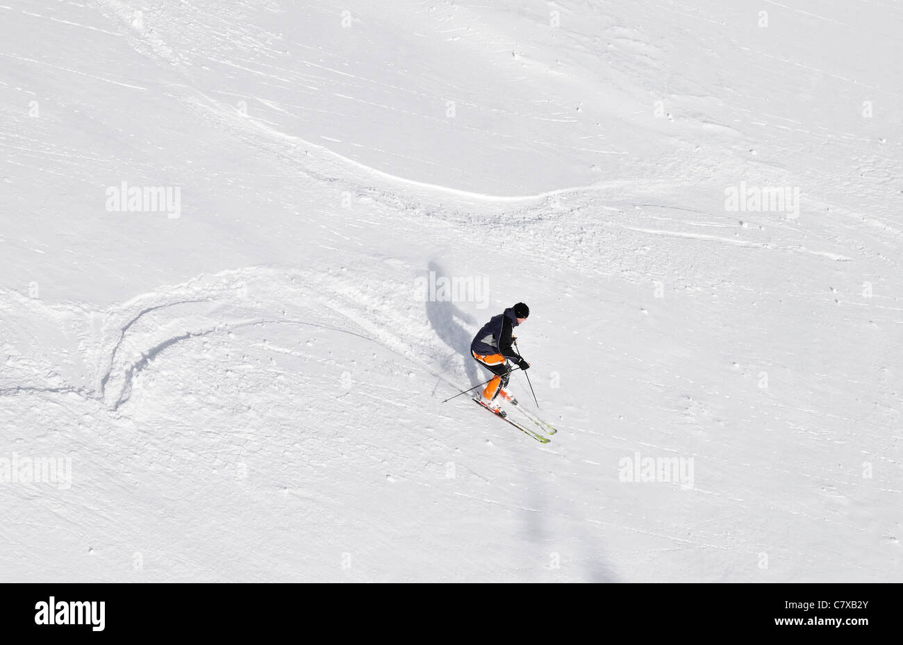 Skier on ski slope, view from above Stock Photo - Alamy