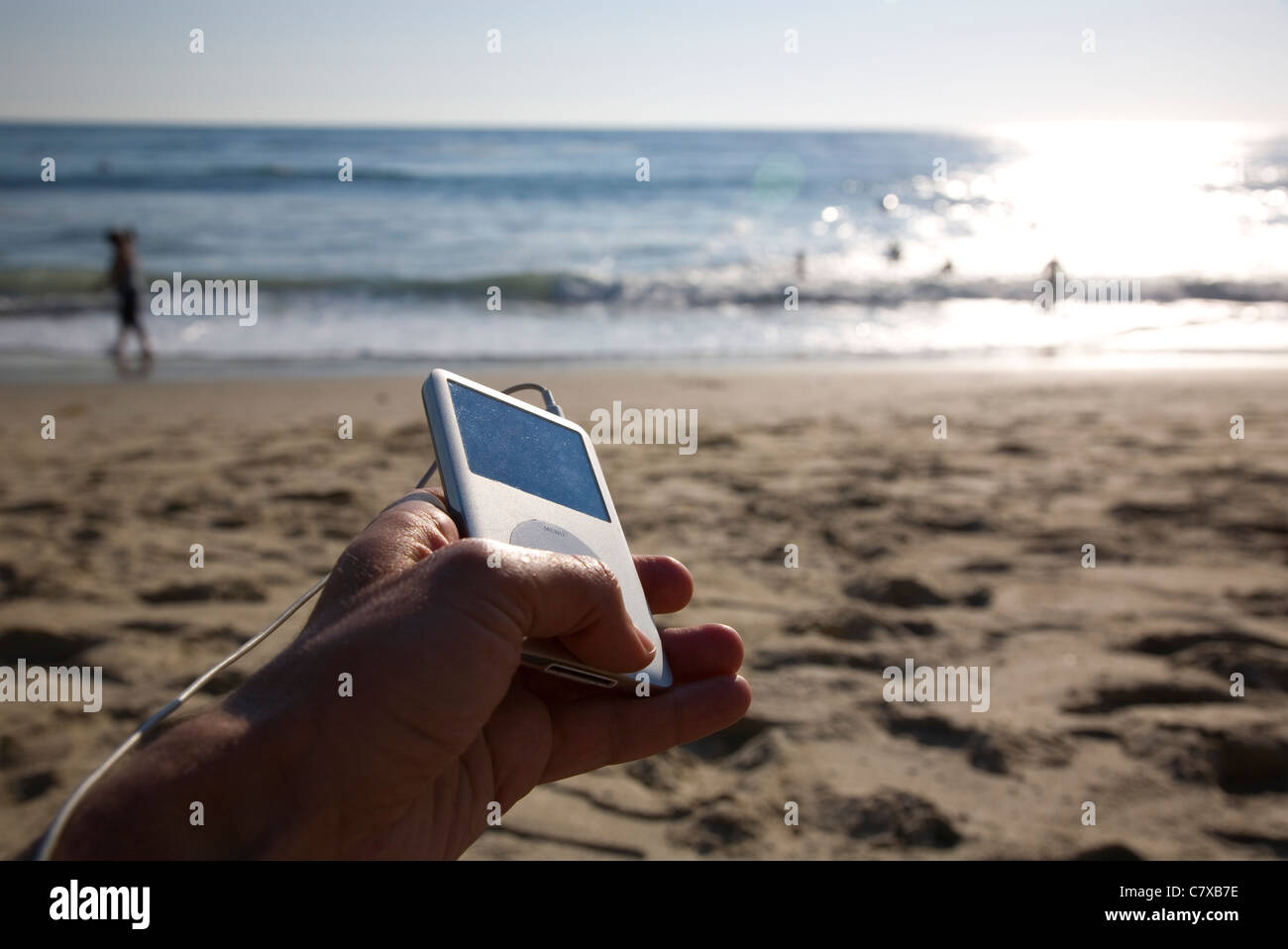 Hand holding ipod High Resolution Stock Photography and Images - Alamy