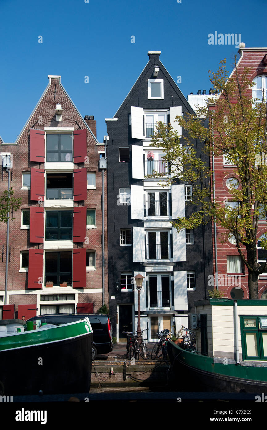 Traditional canal-side buildings in Amsterdam Stock Photo - Alamy