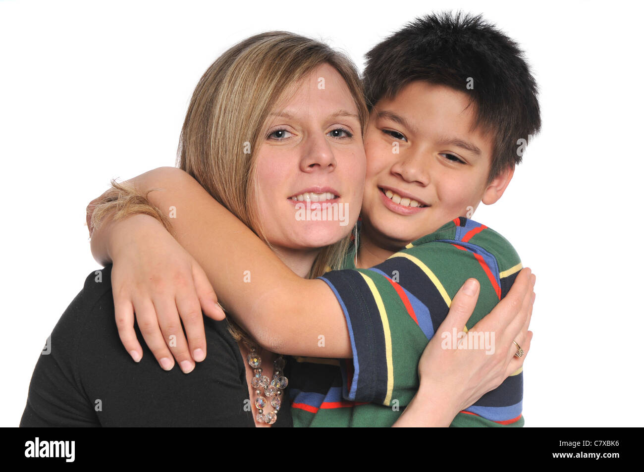 Mother and Son embracing and smiling isolated on a white background ...