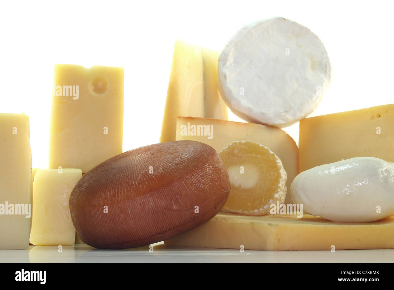 different types of cheese on a white background Stock Photo - Alamy