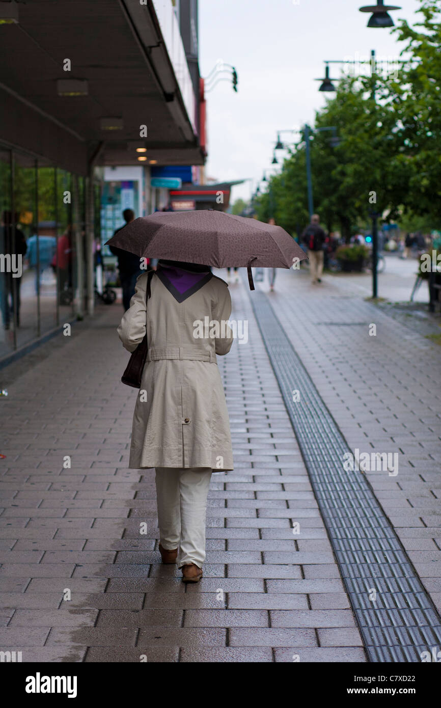 Umbrella walk hi-res stock photography and images - Alamy