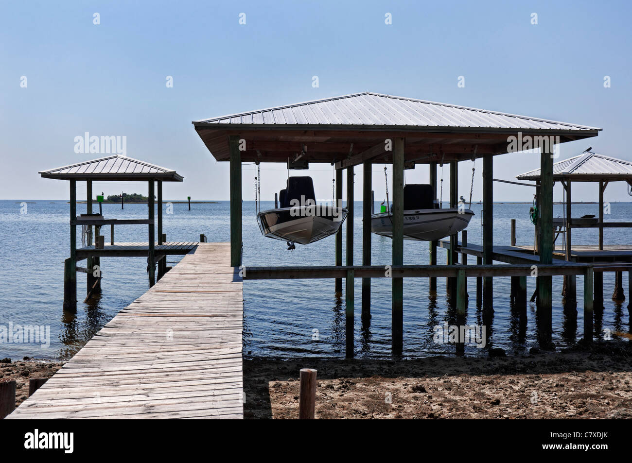 Small boat house and dock system in the funky little Gulf coastal town ...