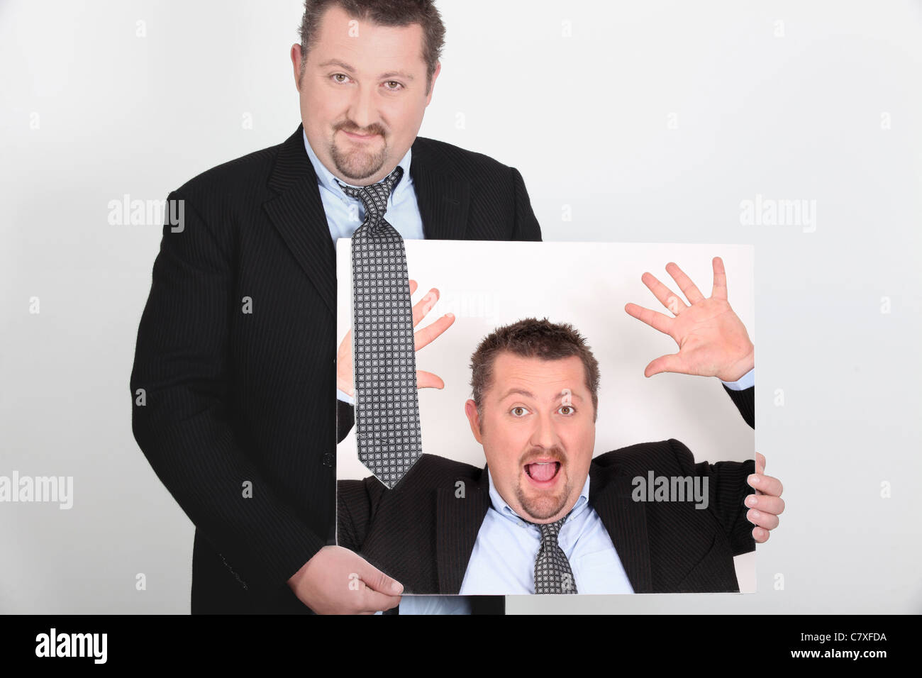 serious but funny Stock Photo - Alamy