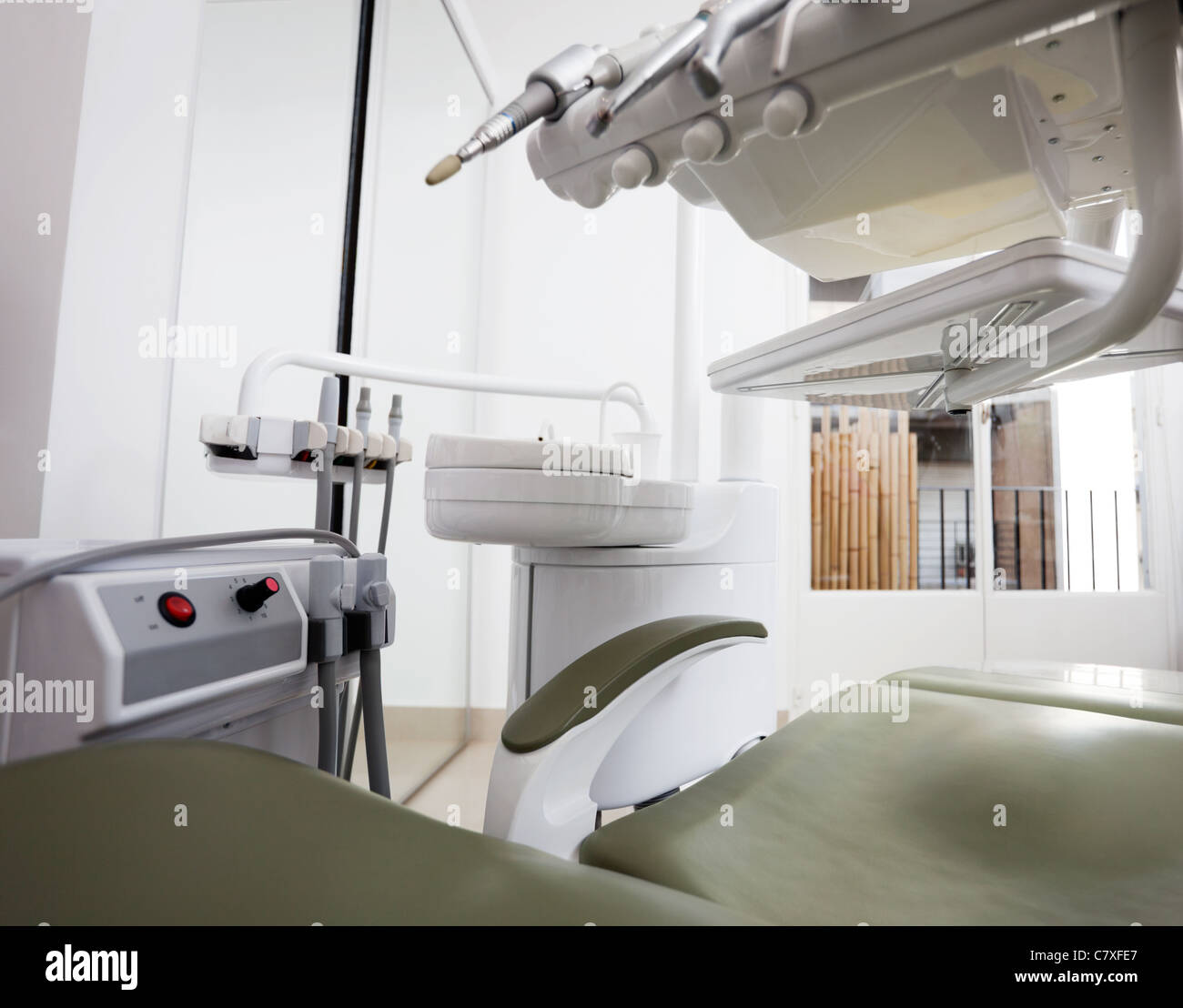 Modern dental chair and tools Stock Photo - Alamy
